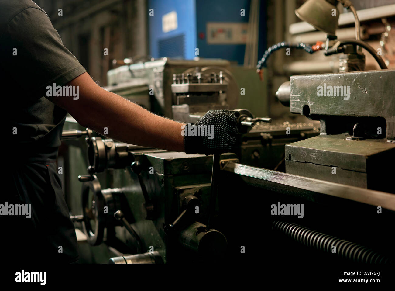 man working on a lathe Stock Photo - Alamy