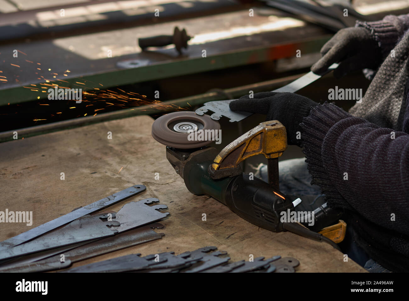 Man grinds steel hi-res stock photography and images - Alamy