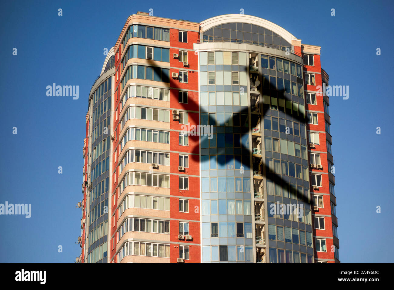 Airplane shadow on skyscraper building. Concept of aviation safety or ...