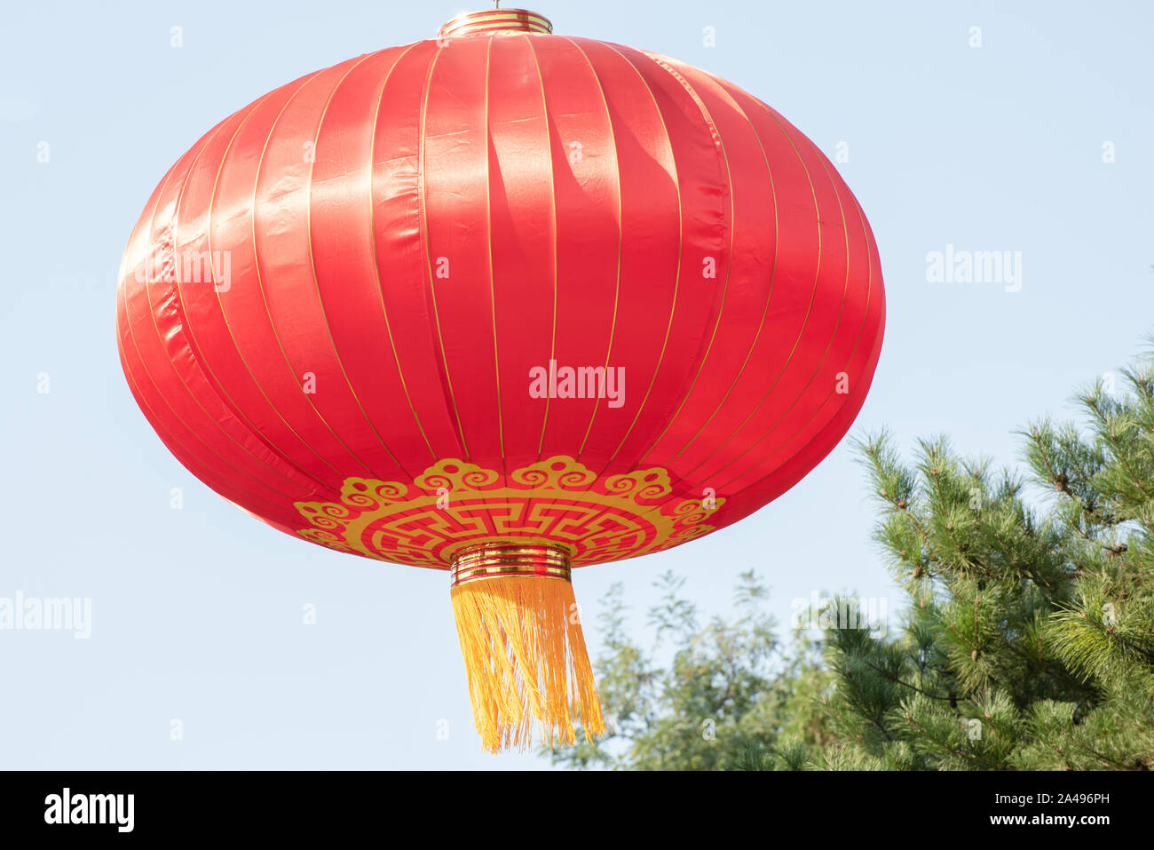 A big red lantern hanging outside Stock Photo - Alamy