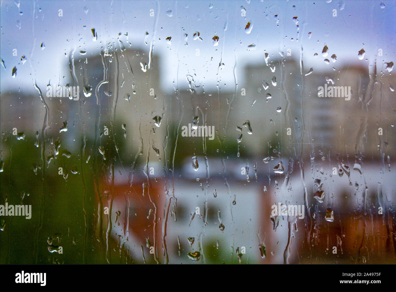 Drops of rain on dirty glass background Stock Photo - Alamy
