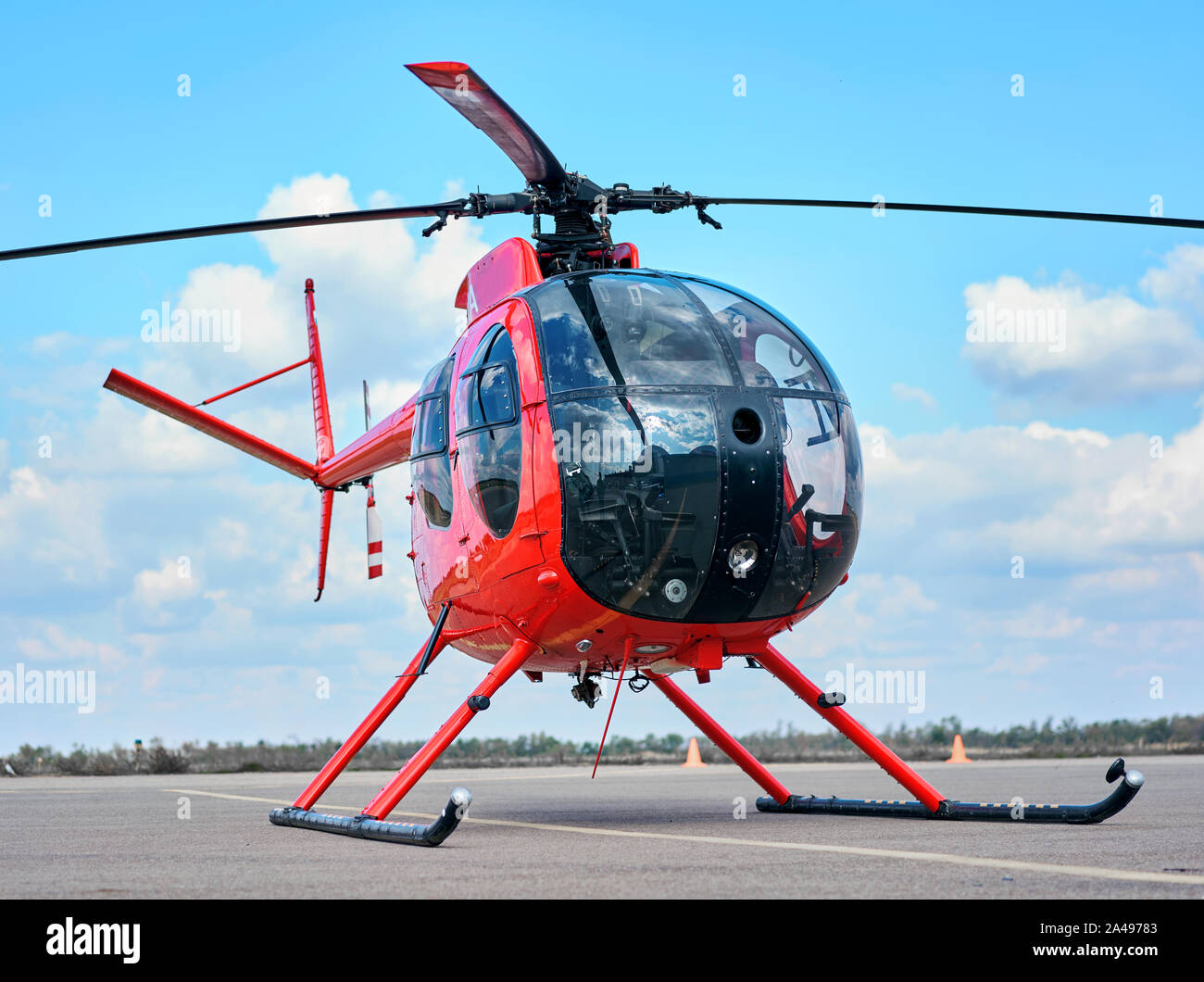 red helicopter on the runway Stock Photo - Alamy