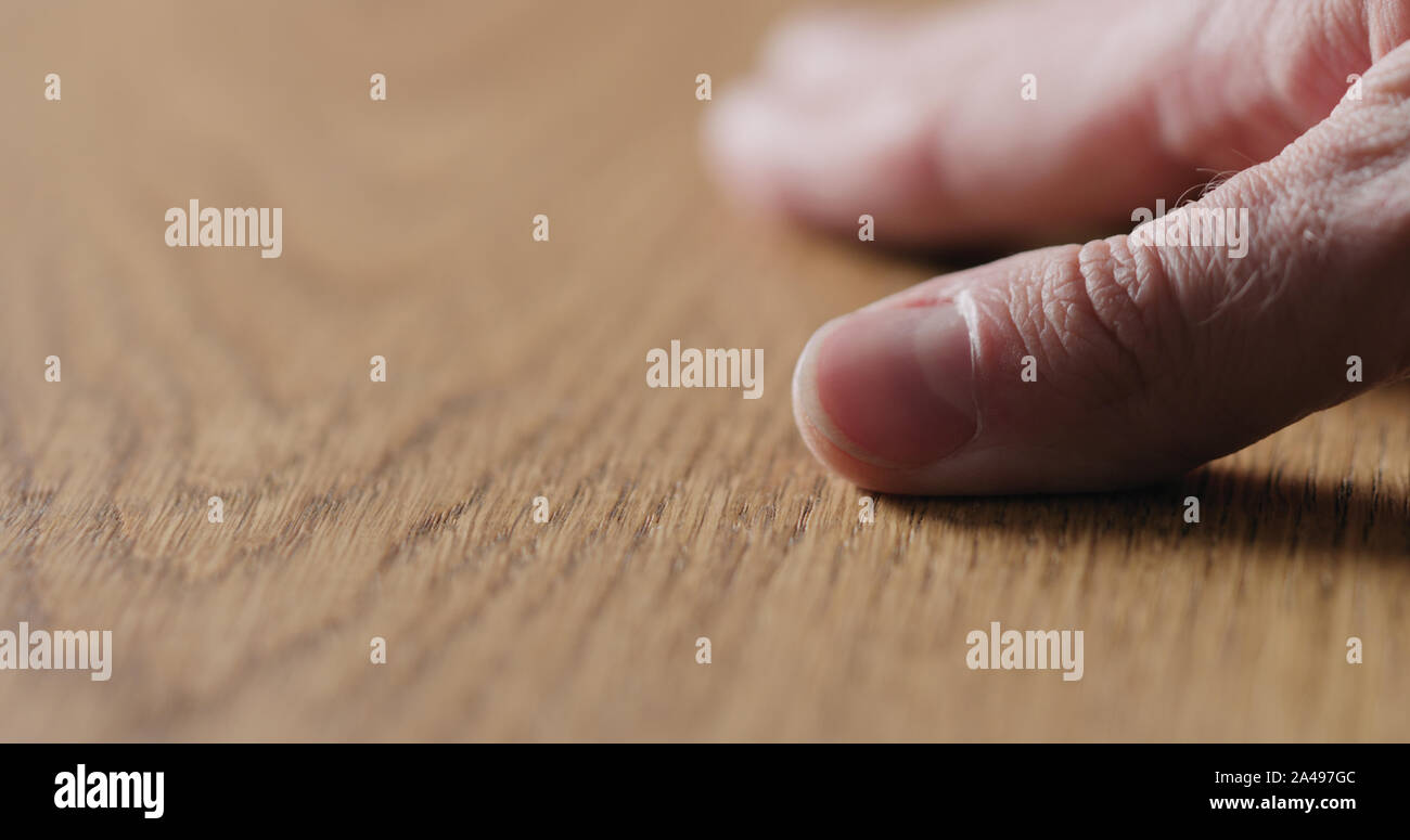 man hand touch oil finished oak wood surface, wide photo Stock Photo ...