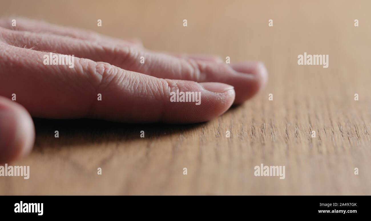man hand touch oil finished oak wood surface, wide photo Stock Photo ...