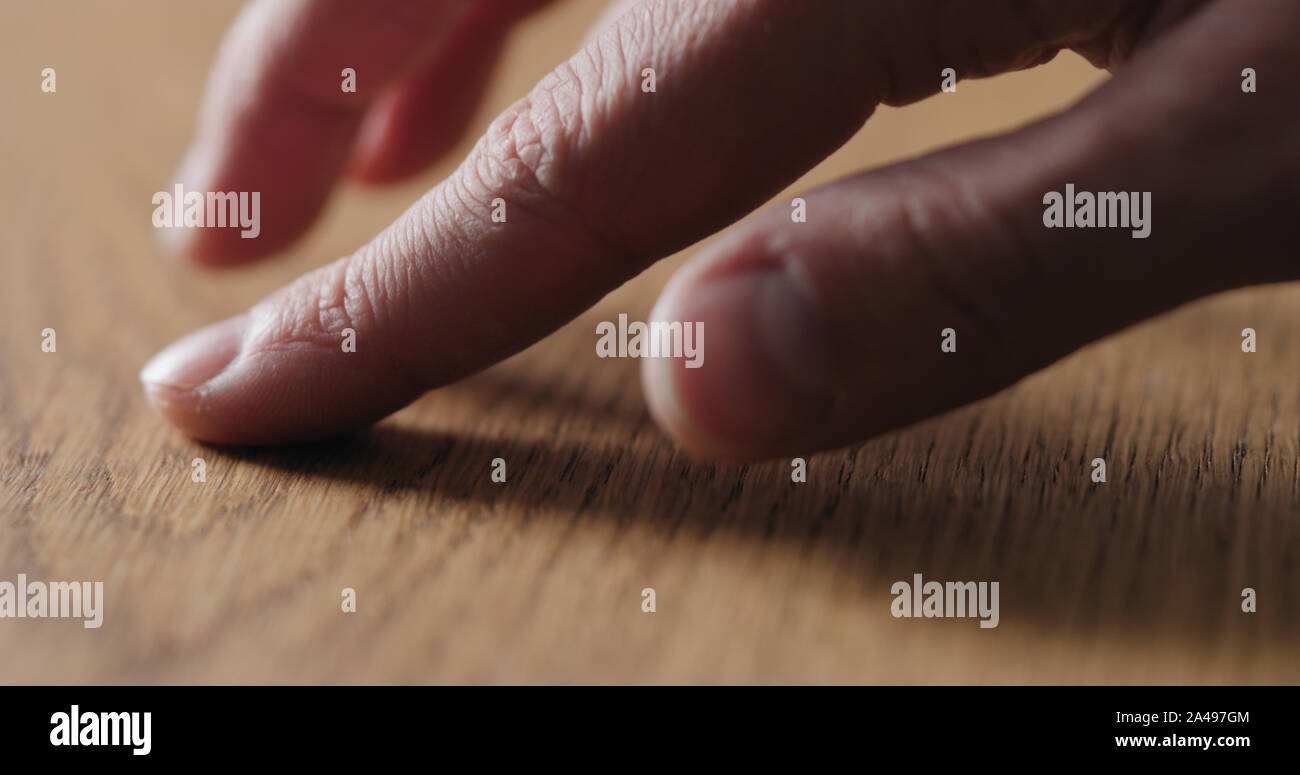 man hand touch oil finished oak wood surface, wide photo Stock Photo ...