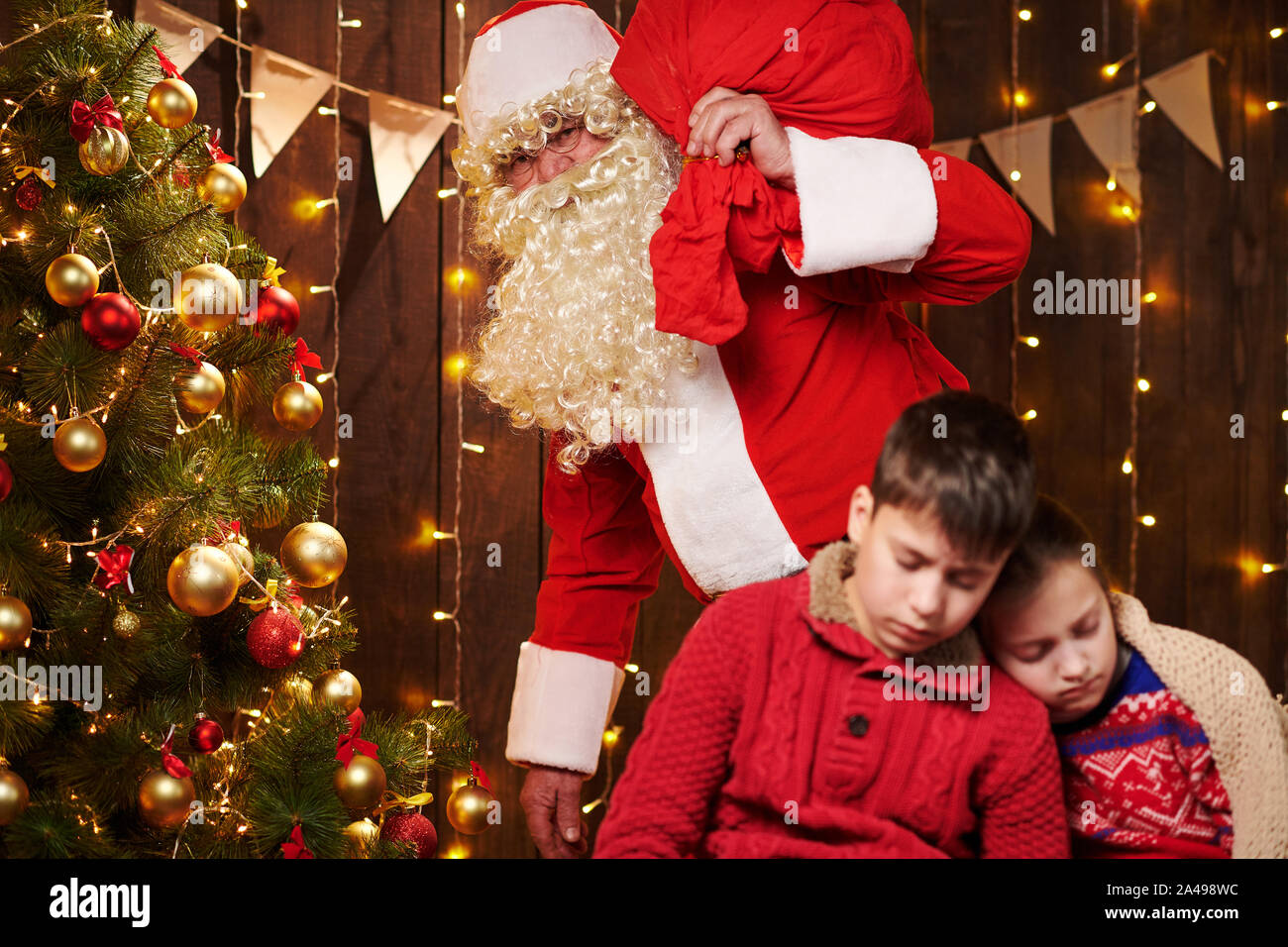 The children waited a long time for Santa, now they fell asleep and ...