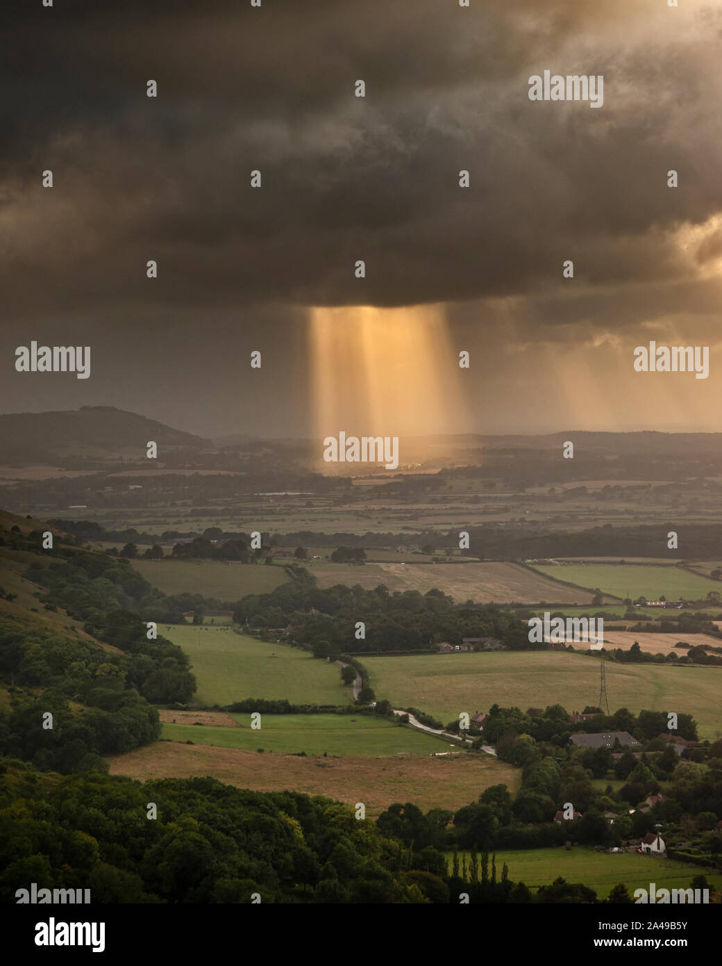 Clouds with light streaming down hi-res stock photography and images ...