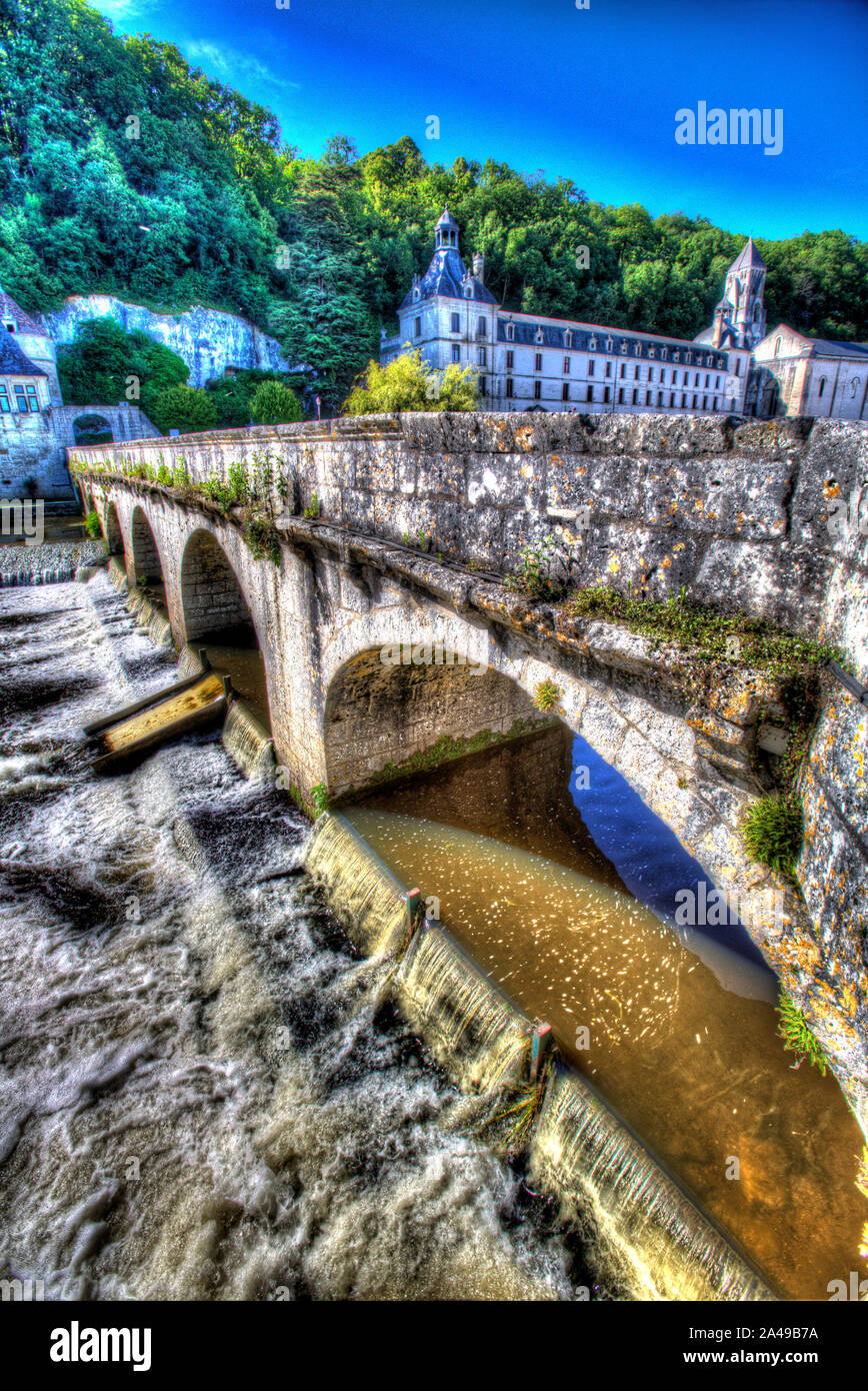 Brantome en Perigord, France. The Pont Coude (Right Angle Bridge) over ...