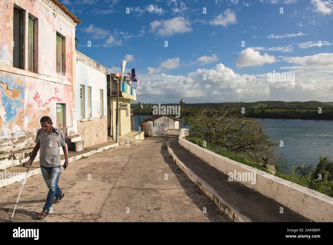 Penedo, Alagoas, Brazil -July 04, 2016: Man walking using a crutch in ...