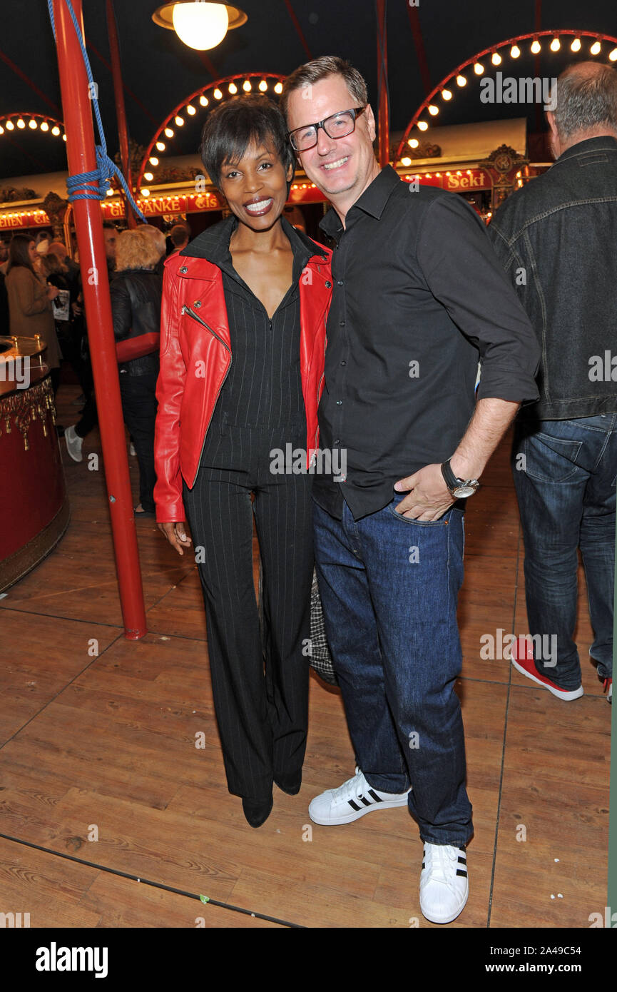 Munich, Germany. 12th Oct, 2019. The actor Florian Simbeck and his wife ...