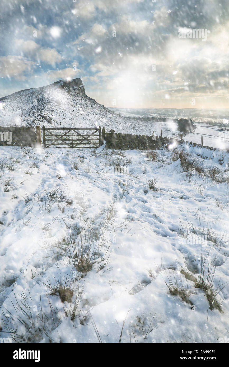 Stunning Winter sunset over countryside landscape with moody sky and ...