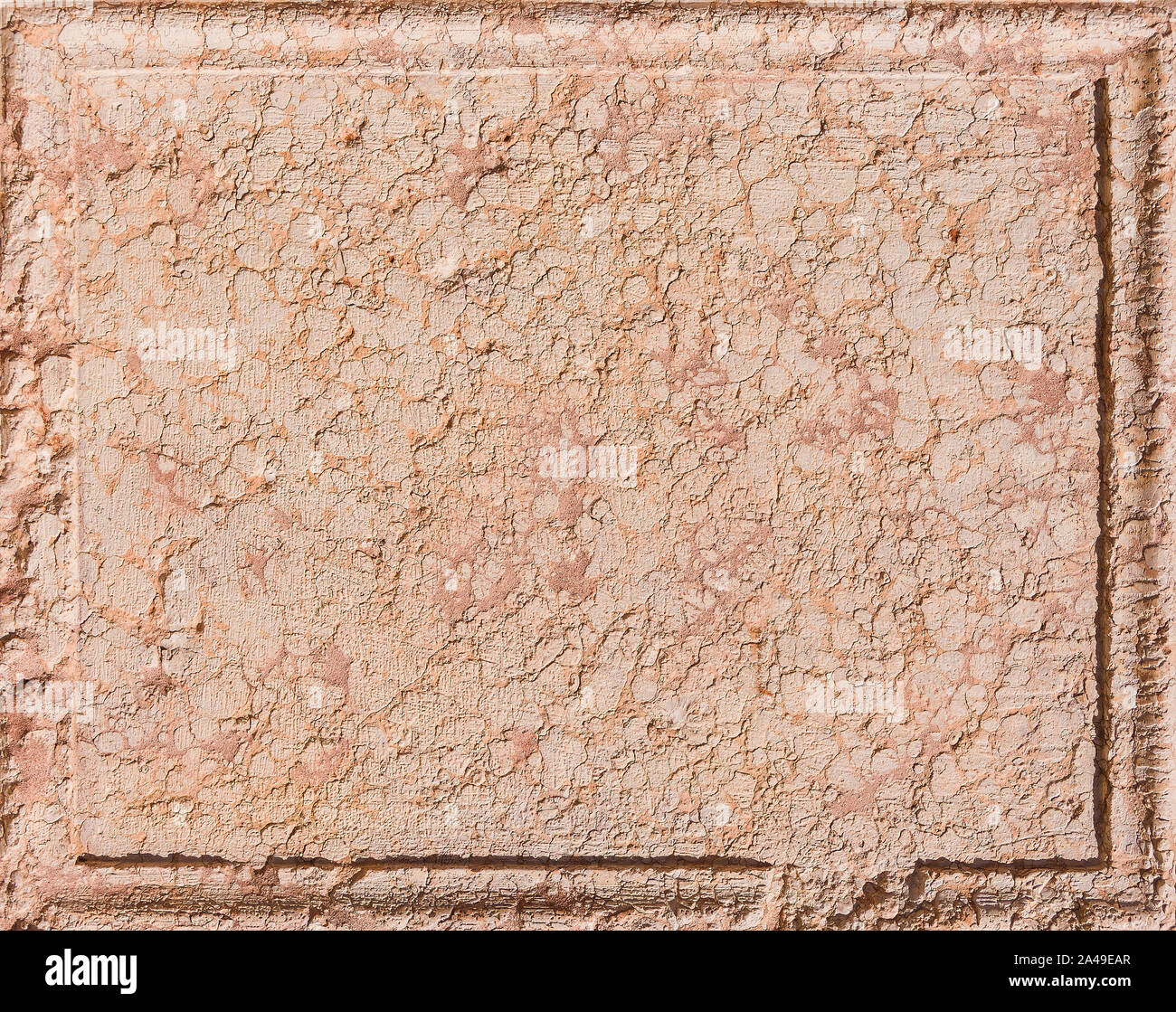 Old and damaged pink Istrian stone wall as background Stock Photo - Alamy
