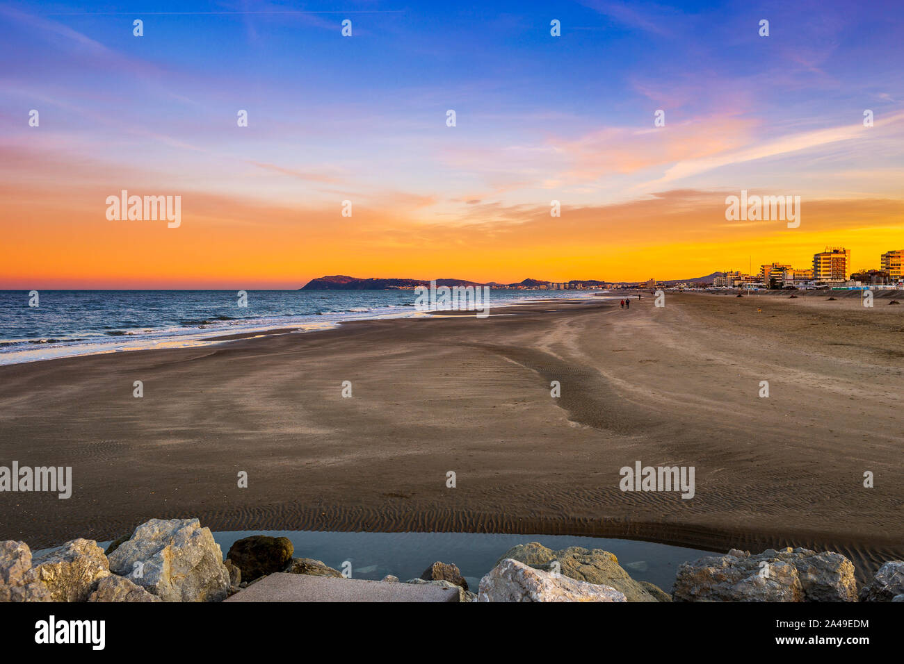 Sunset at the beach golden hour Stock Photo - Alamy