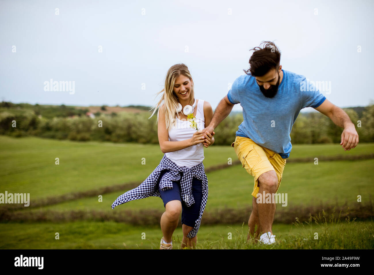 Running through grass hi-res stock photography and images - Alamy