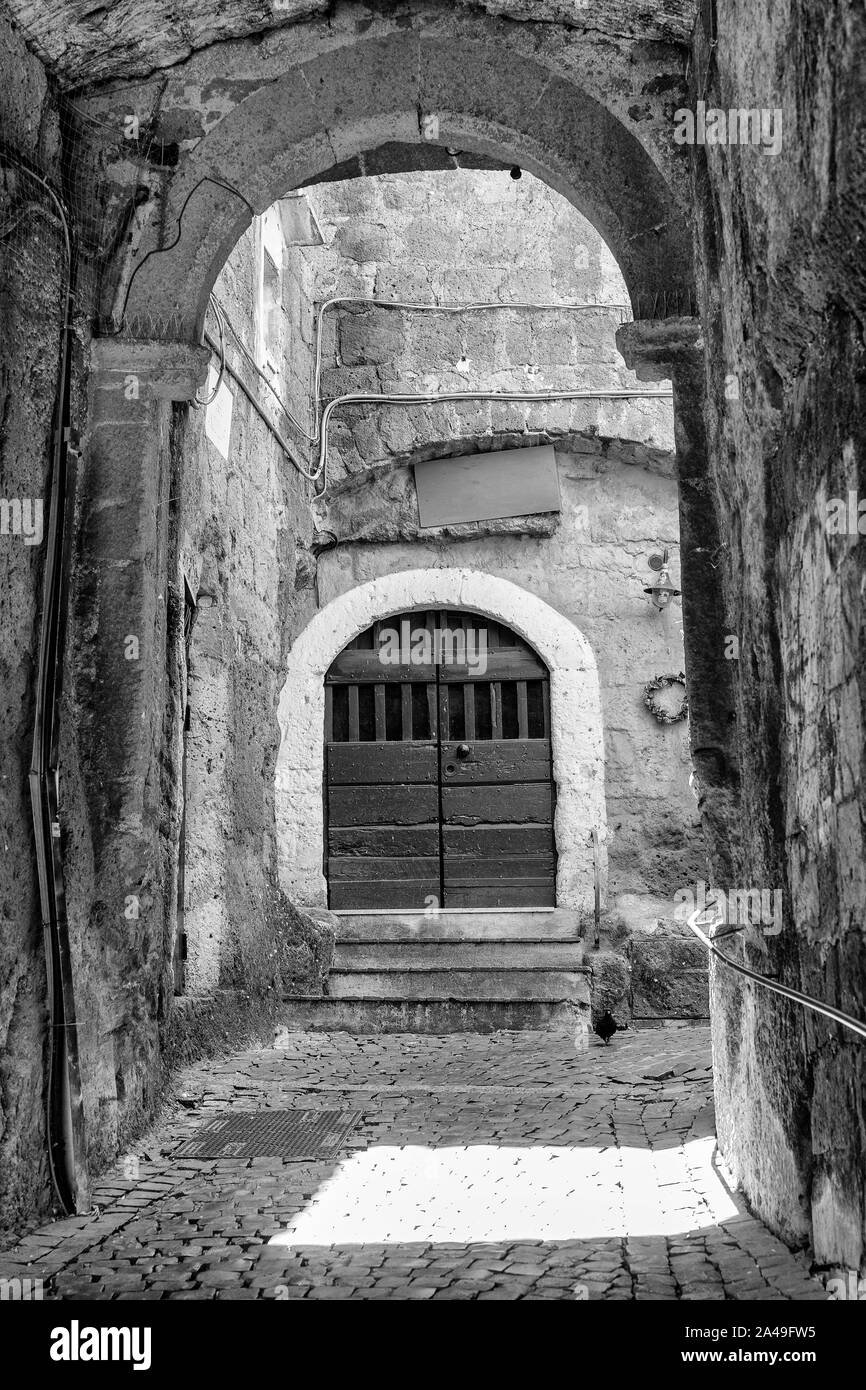 Calcata, Rome, Lazio, Italy: typical alley of the medieval village ...