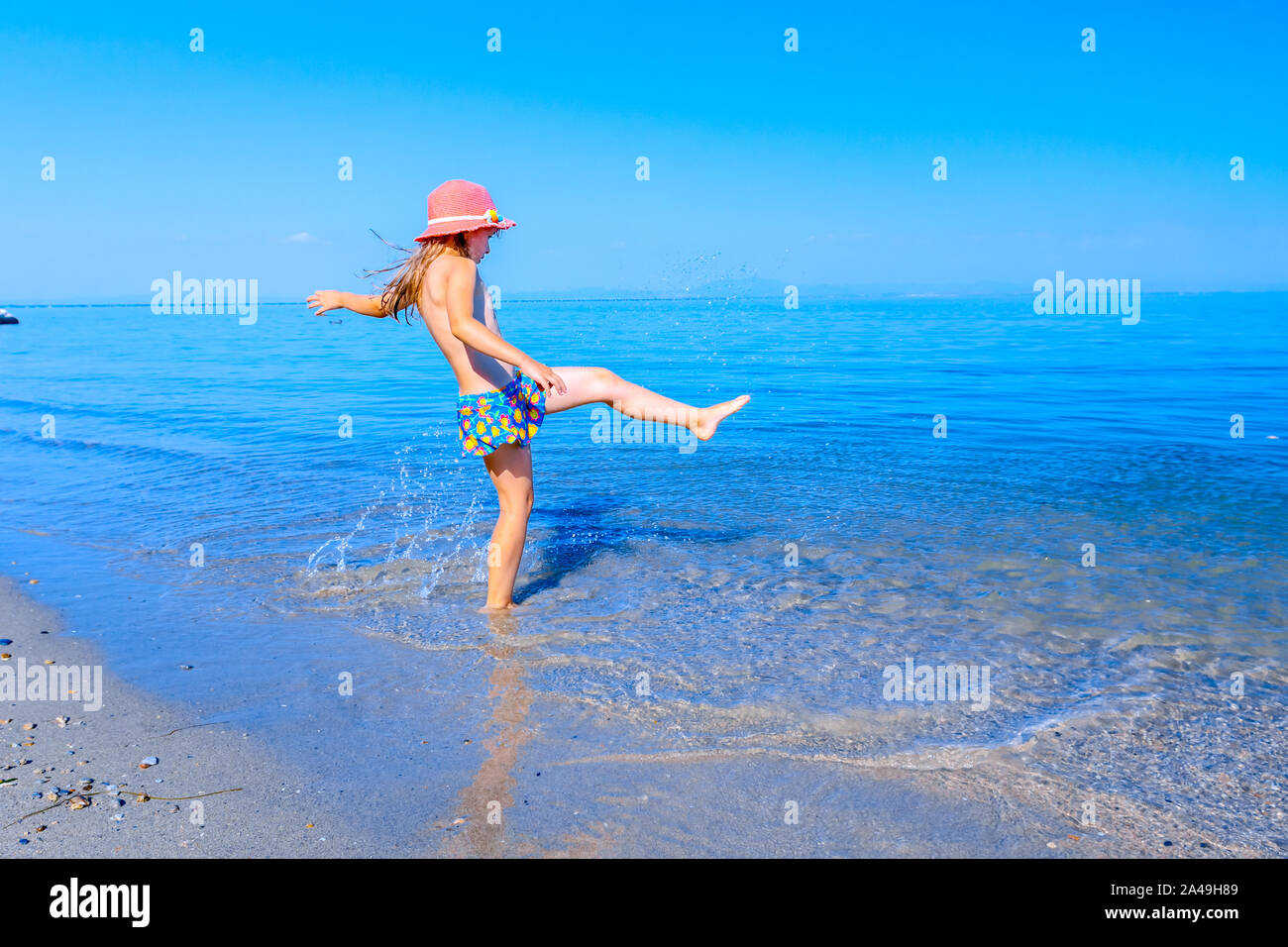 Bikini woman child in shallow hi-res stock photography and images - Alamy