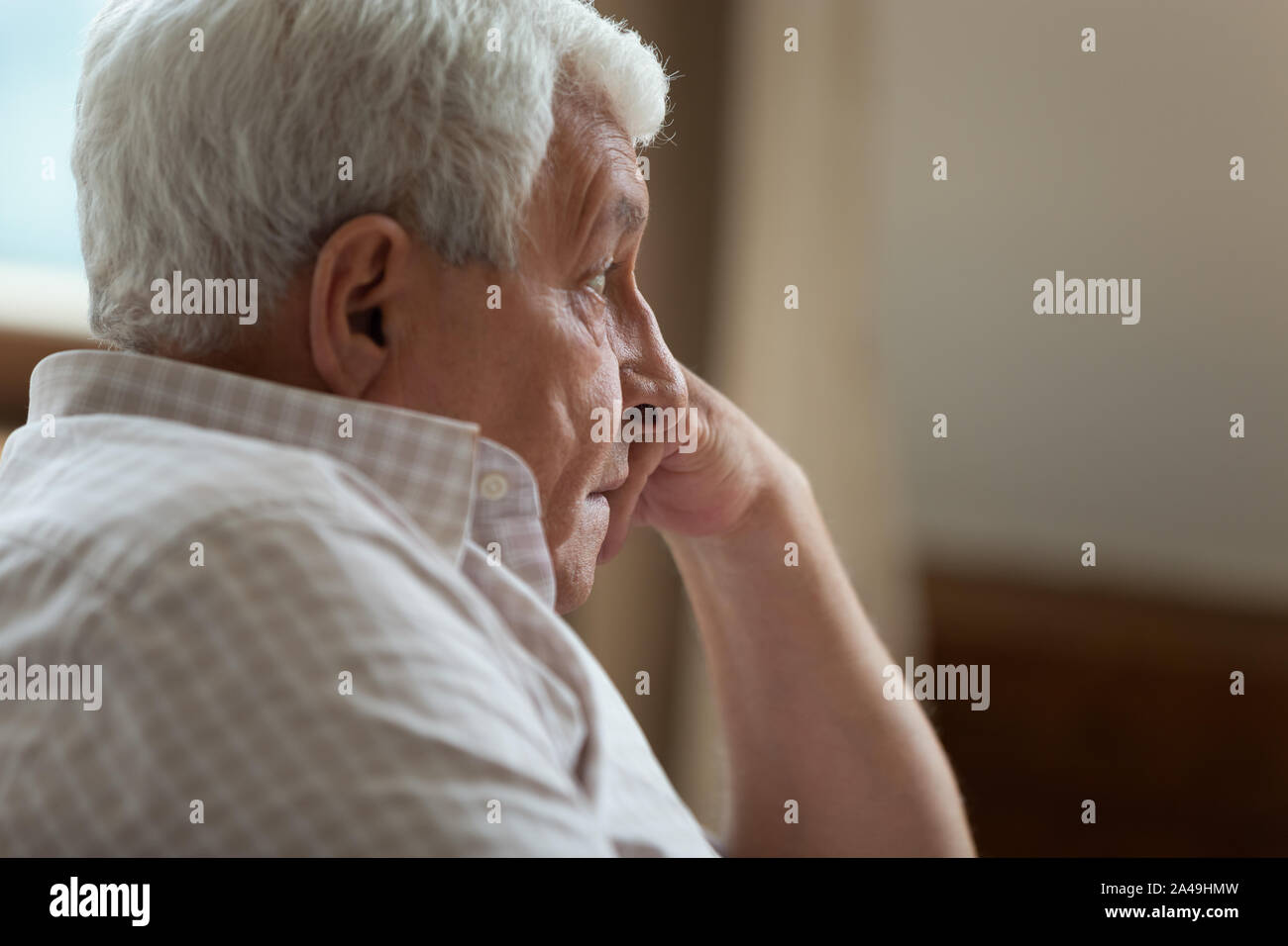 Close up side view pensive senior man lost in thoughts Stock Photo - Alamy