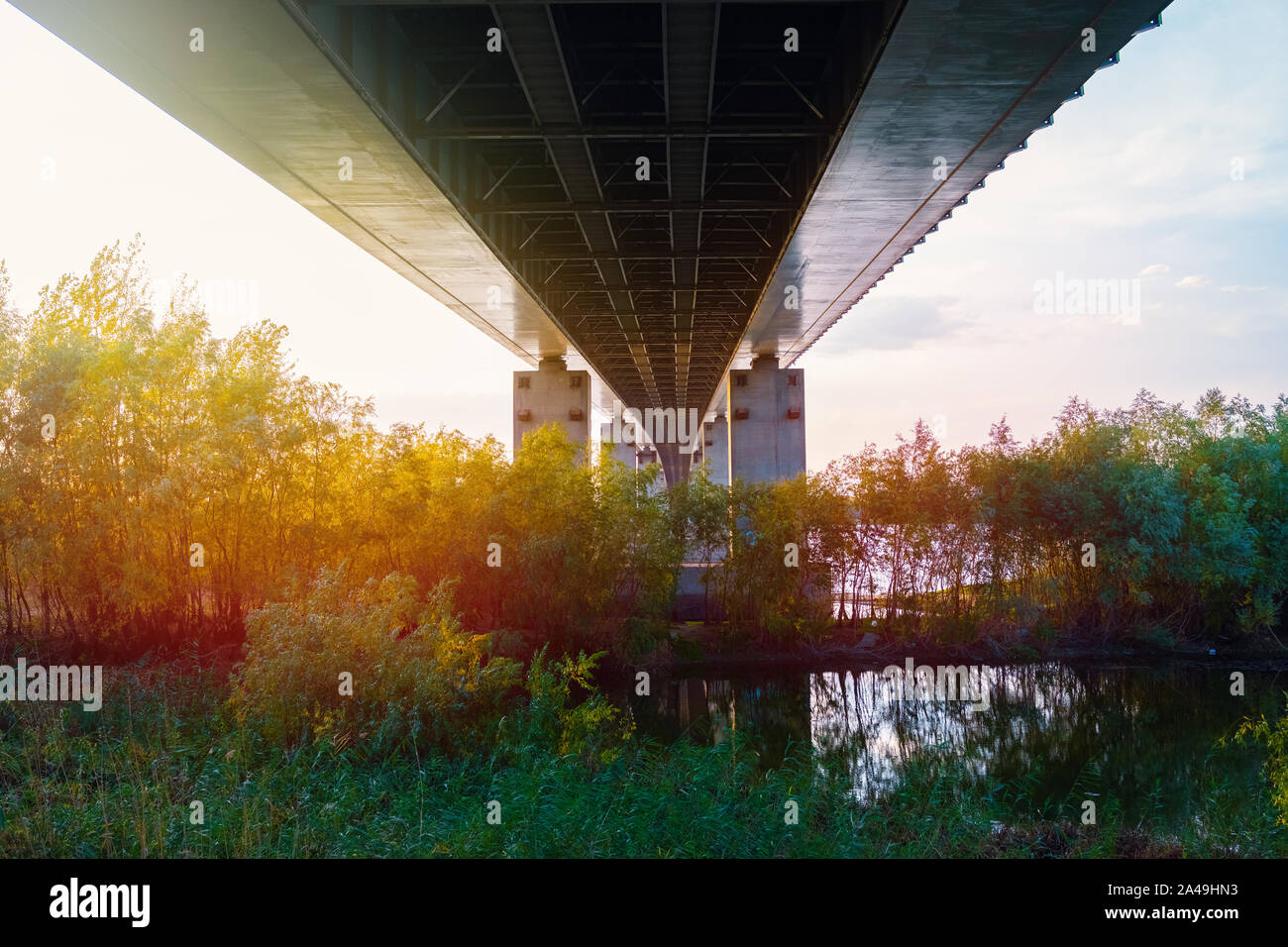 Landscape view of river under arch bridge hi-res stock photography and ...