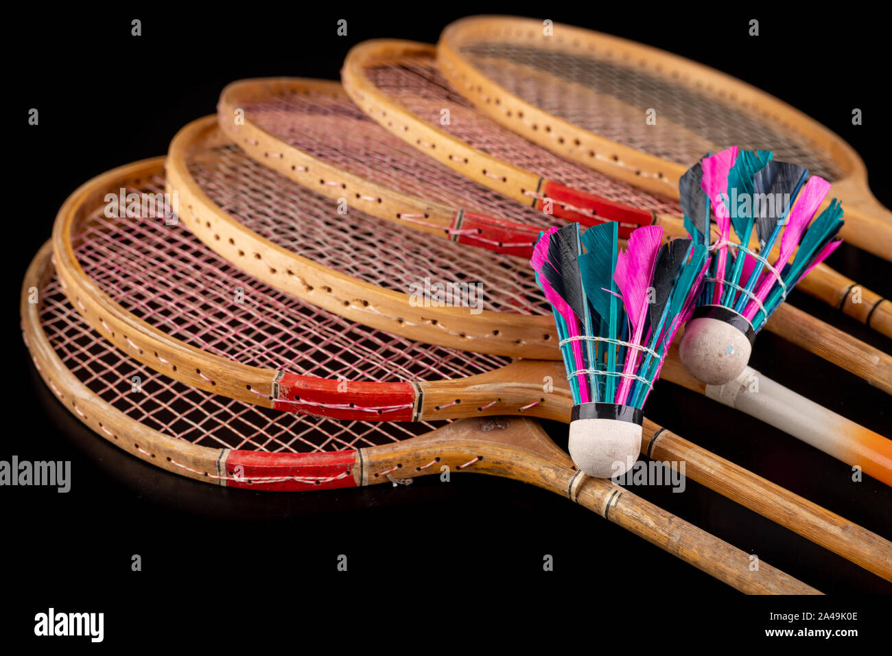Wooden badminton rackets and shuttlecocks. Accessories for team games ...