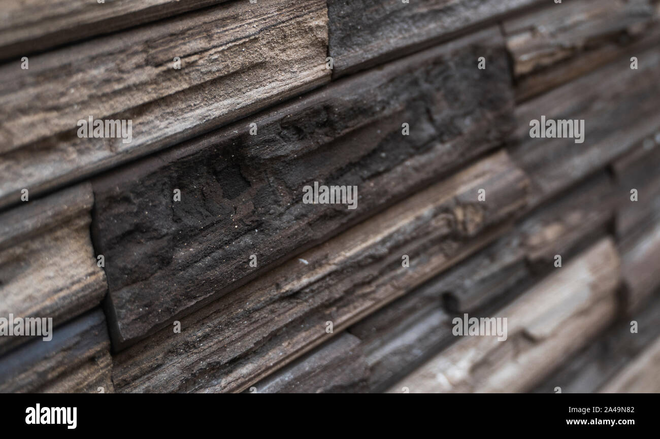 Natural stone bricks as a decoration on a wall. Natural stone wall ...