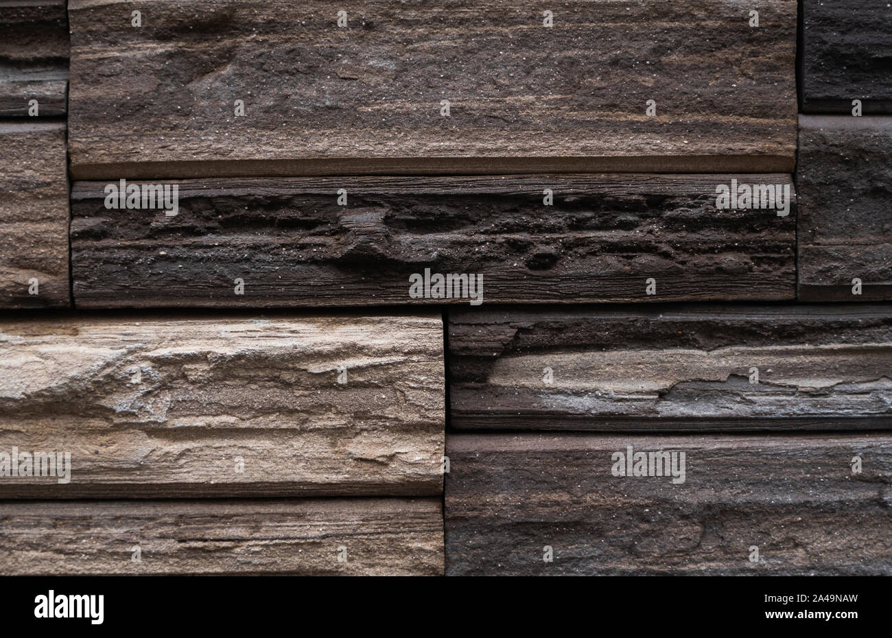 Natural stone bricks as a decoration on a wall. Natural stone wall ...