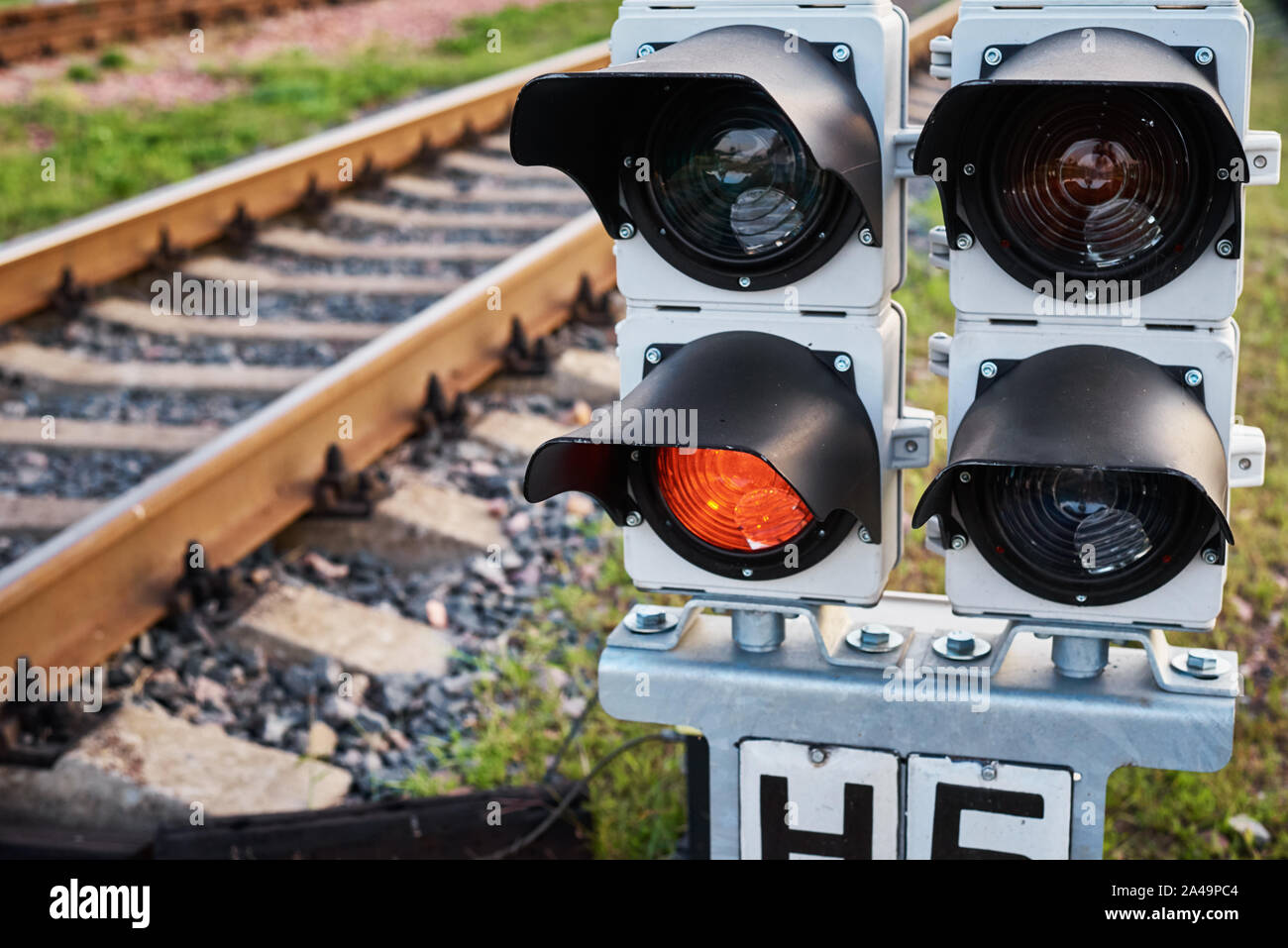 Traffic light show red signal on railway, close up Stock Photo - Alamy