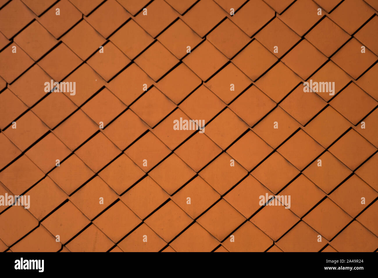 Natural orange roof tiles on a building as a texture Stock Photo - Alamy