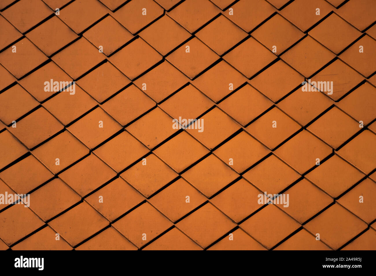 Natural orange roof tiles on a building as a texture Stock Photo - Alamy