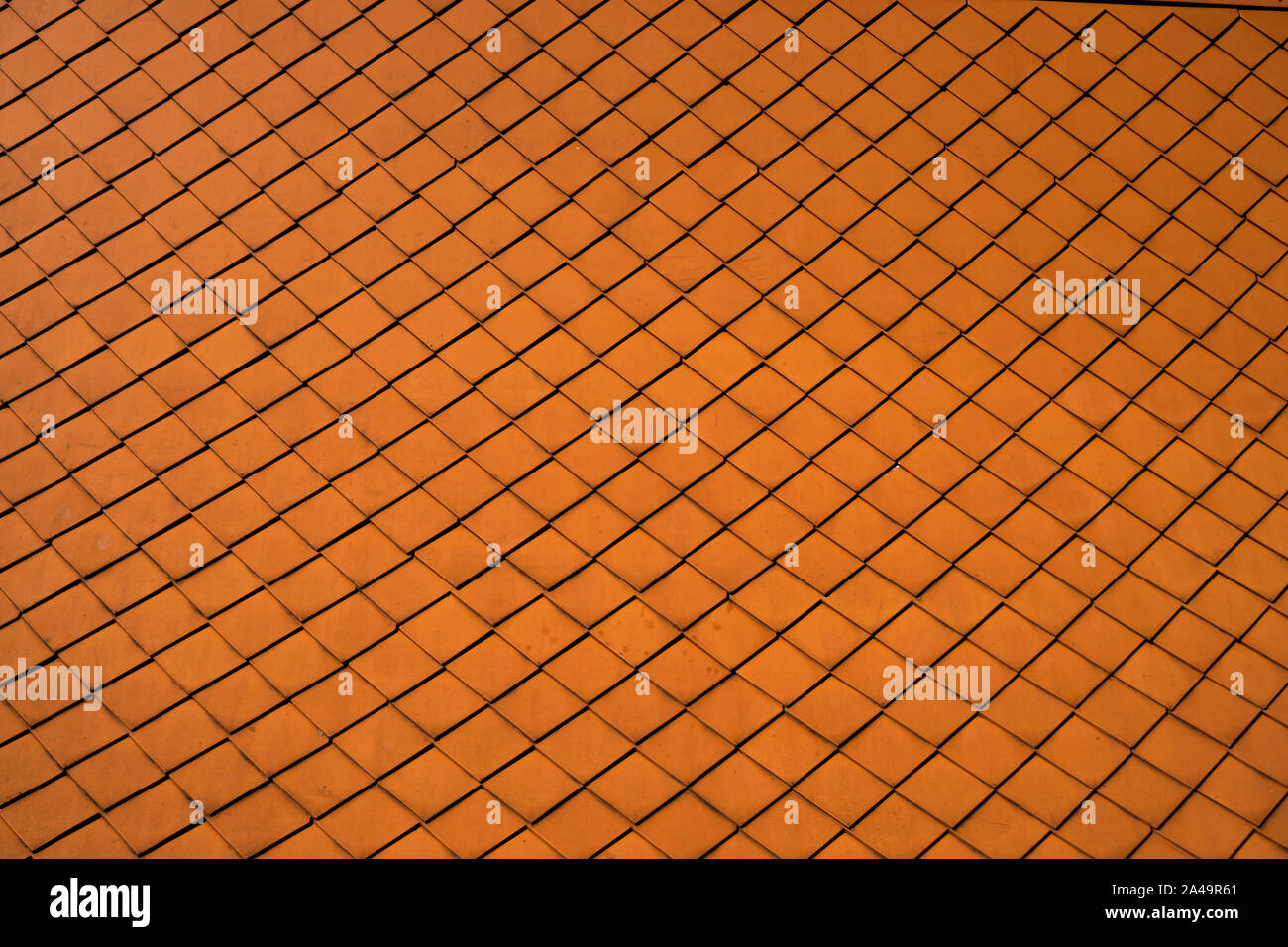 Natural orange roof tiles on a building as a texture Stock Photo - Alamy