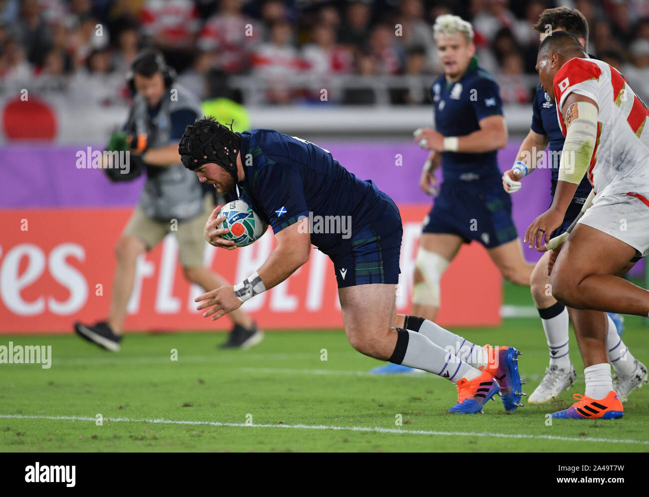 Scotland's Zander Fagerson scores his sides third try during the 2019 ...