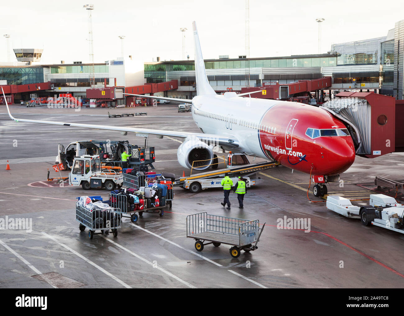 Cargo loading of aircraft from the airline Norwegian at Arlanda Airport ...