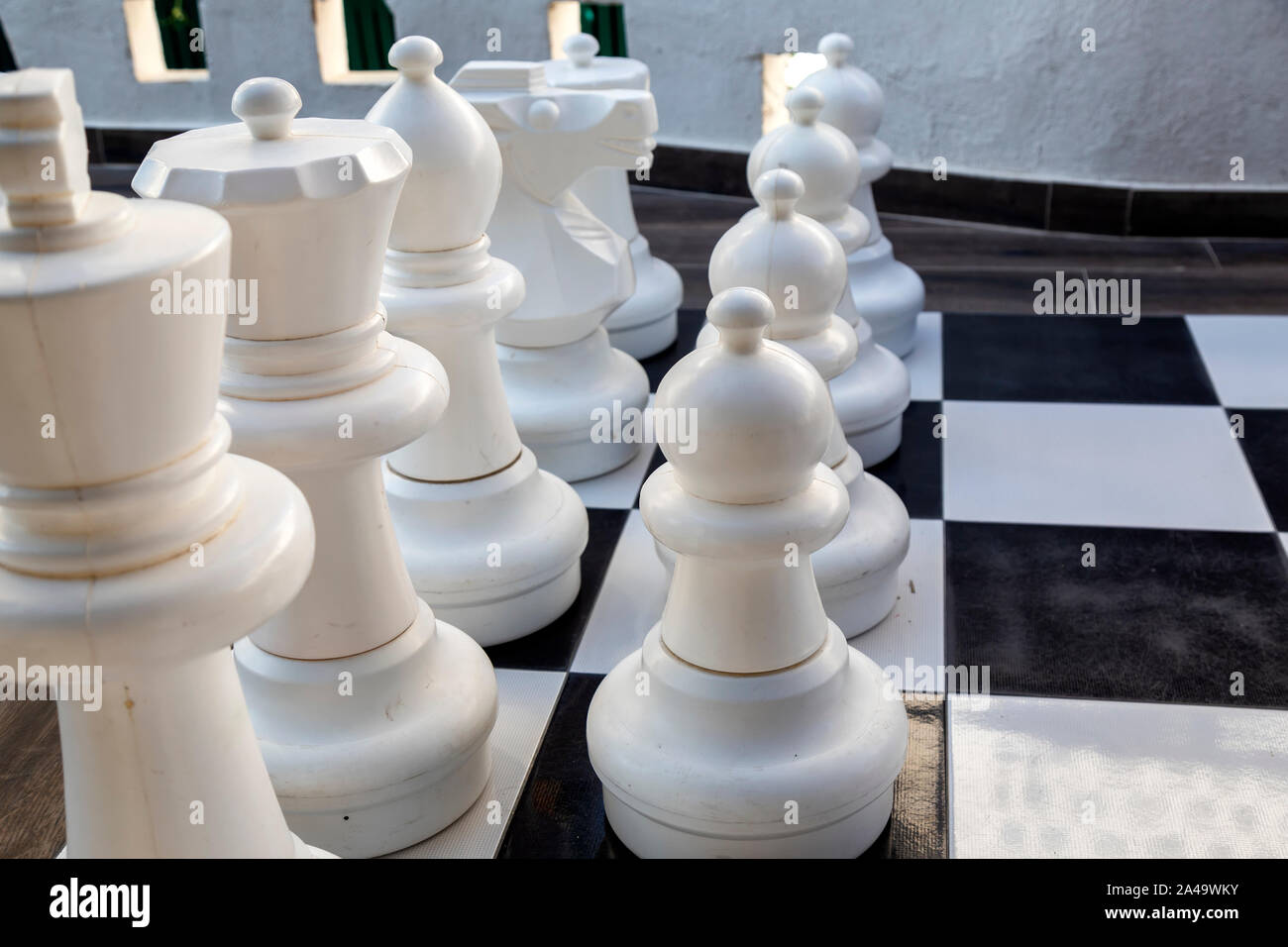White large plastic figures, playing chess. Abstract: make a move Stock ...