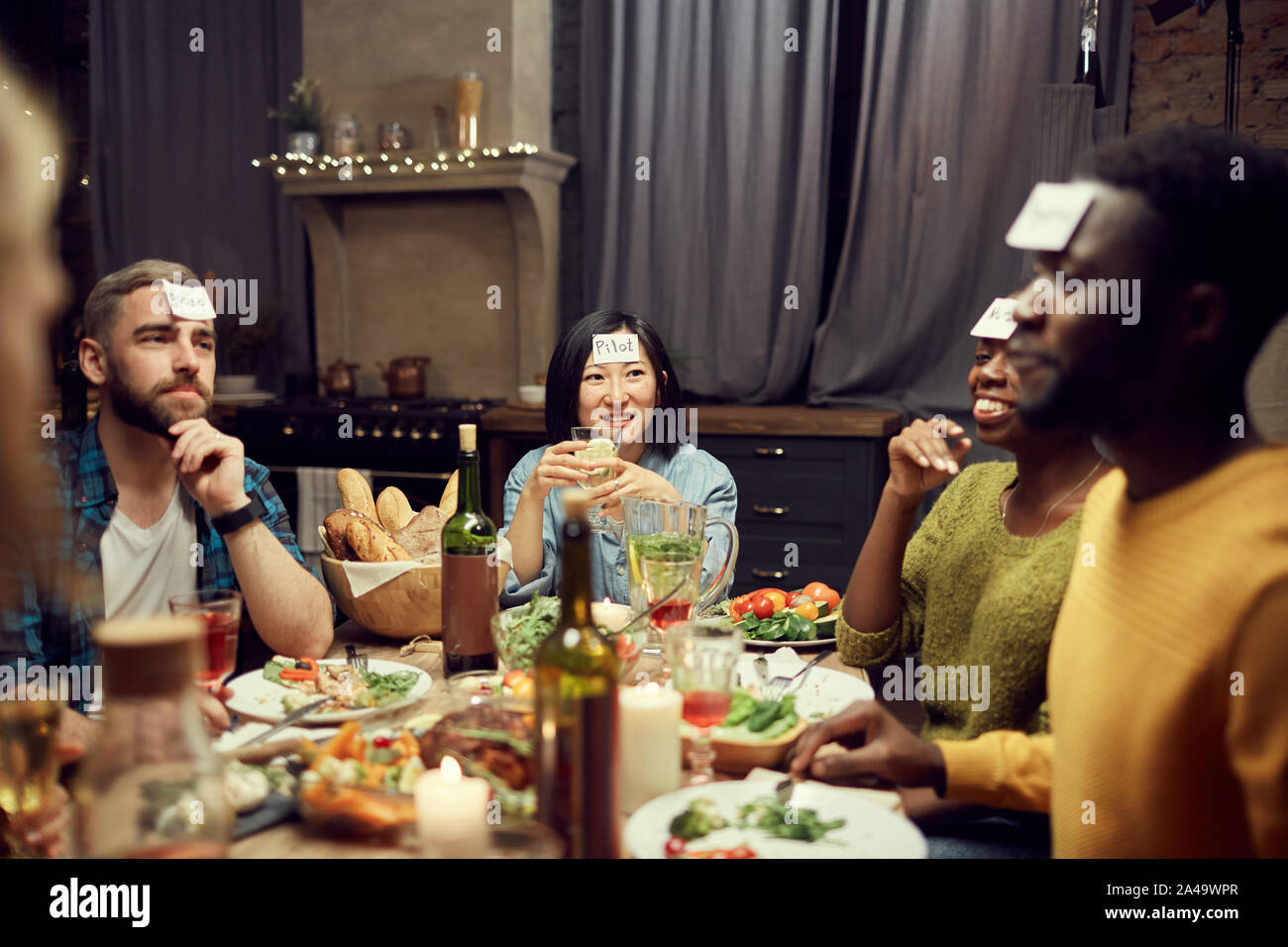 Multi ethnic people enjoying game hi-res stock photography and images ...