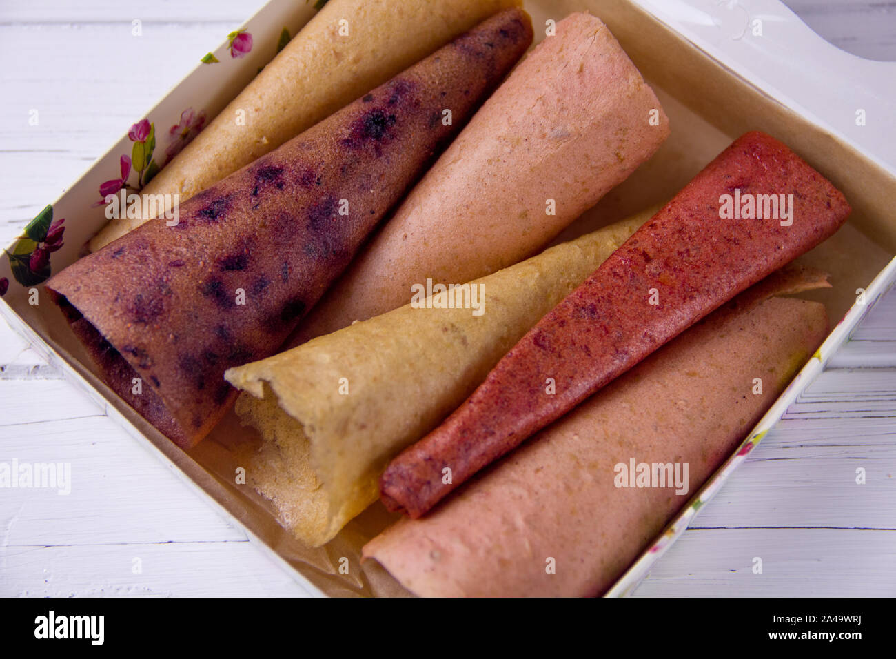 handmade homemade pastila in a box on a light background. A set of ...