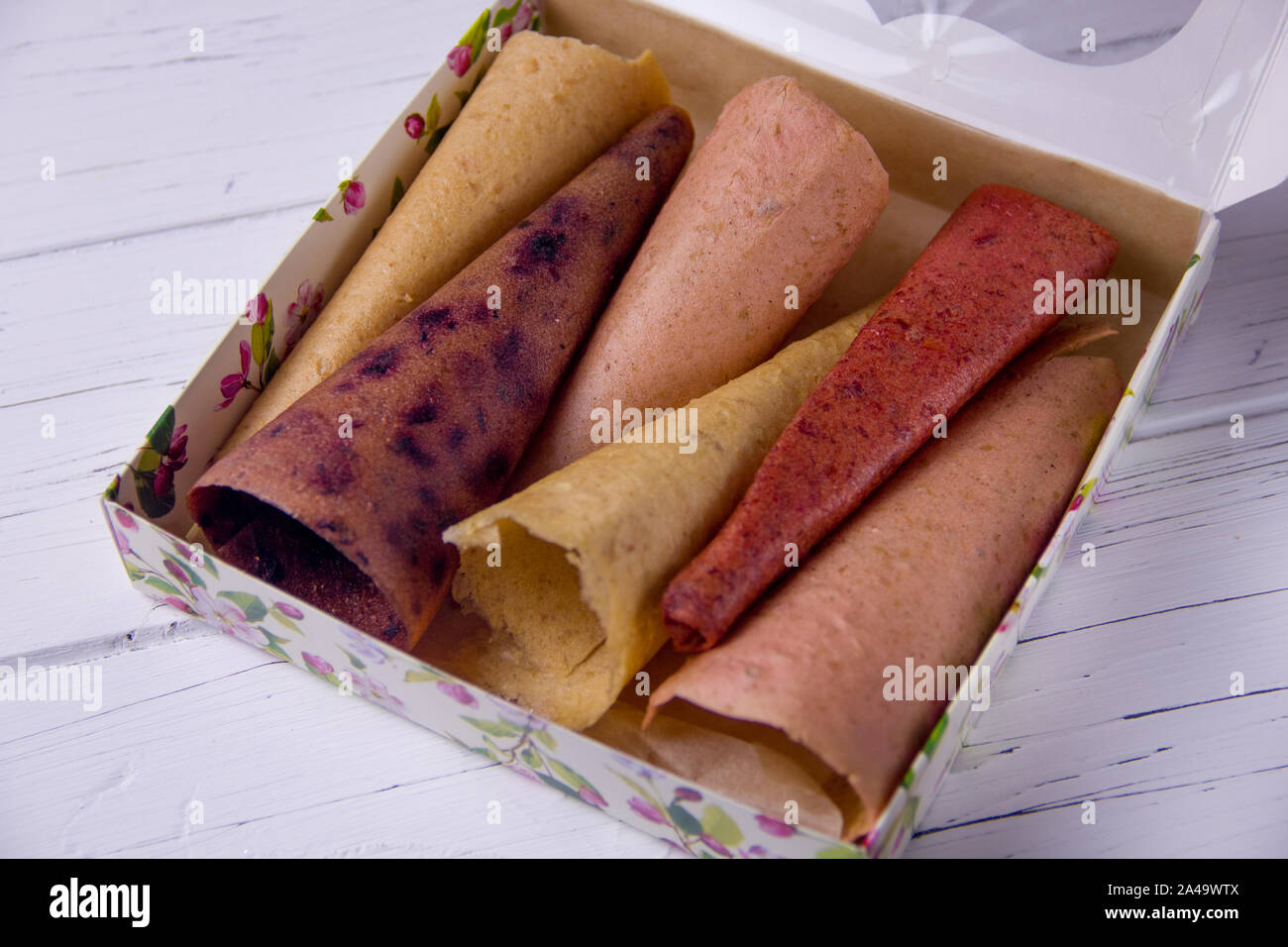 handmade homemade pastila in a box on a light background. A set of ...