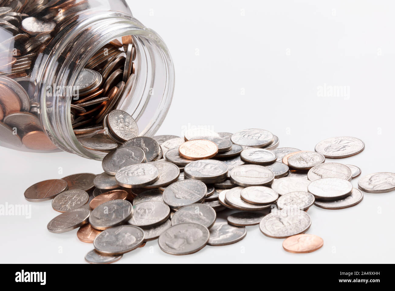 US coins in a jar isolated on white background with copy space Stock ...