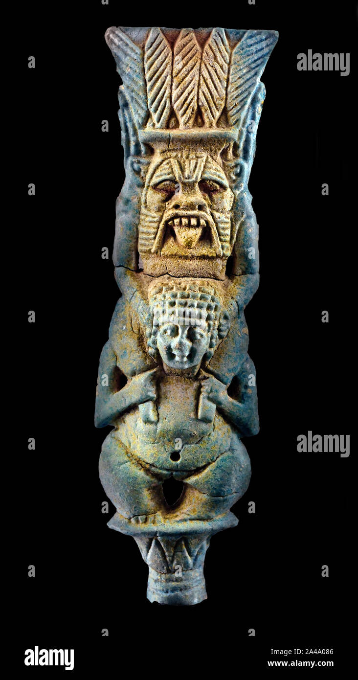 The Egyptian god Bes, protector of households on the shoulders of his ...