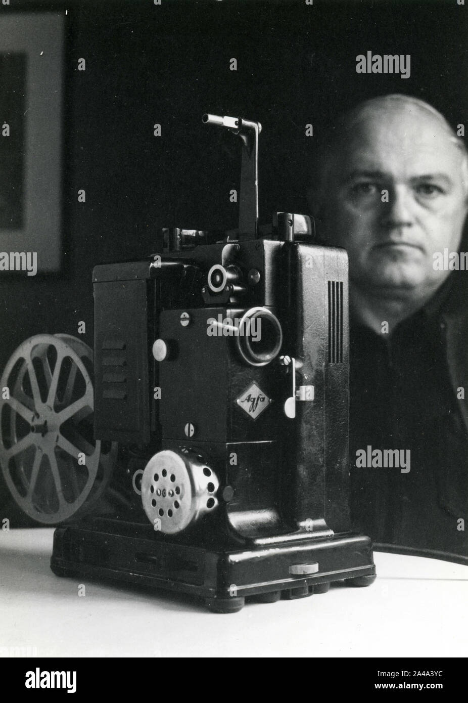Old Agfa projector and operator, 1930s Stock Photo - Alamy