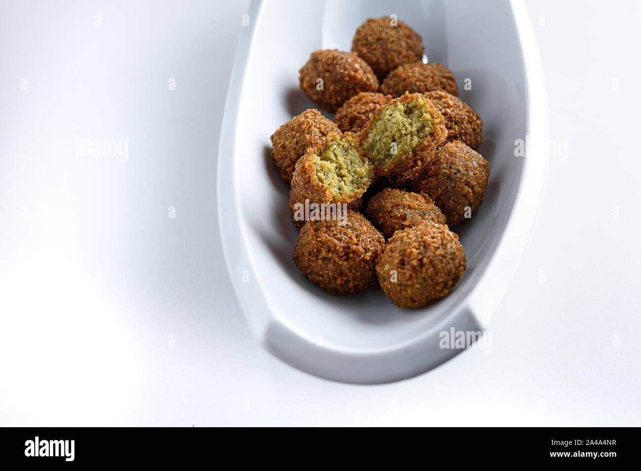 Falafel balls on a white background. Falafel is a traditional Middle ...