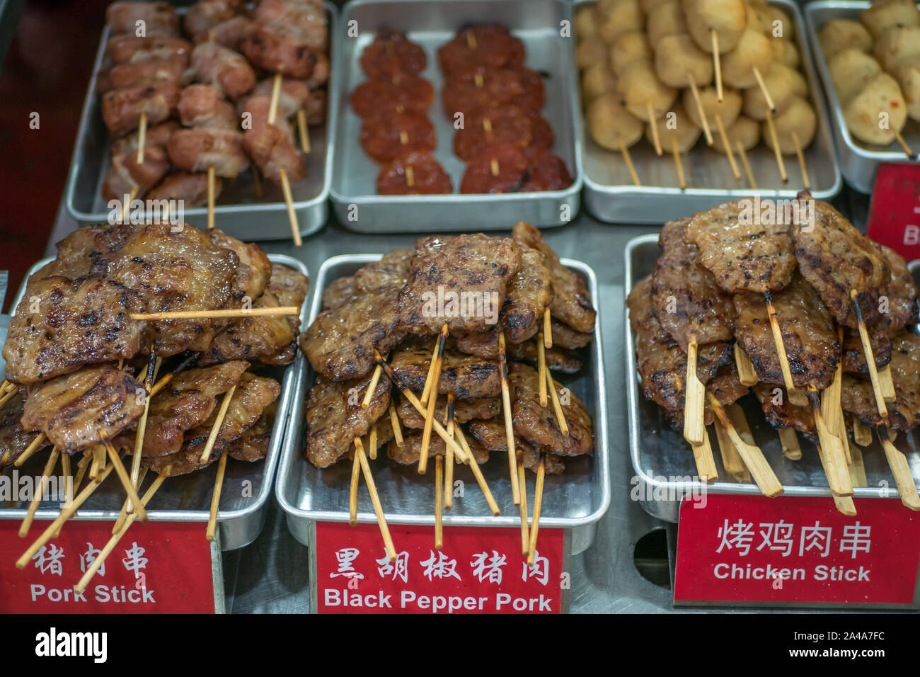 Various types of barbecue meat skewer selling at the food stall Stock ...