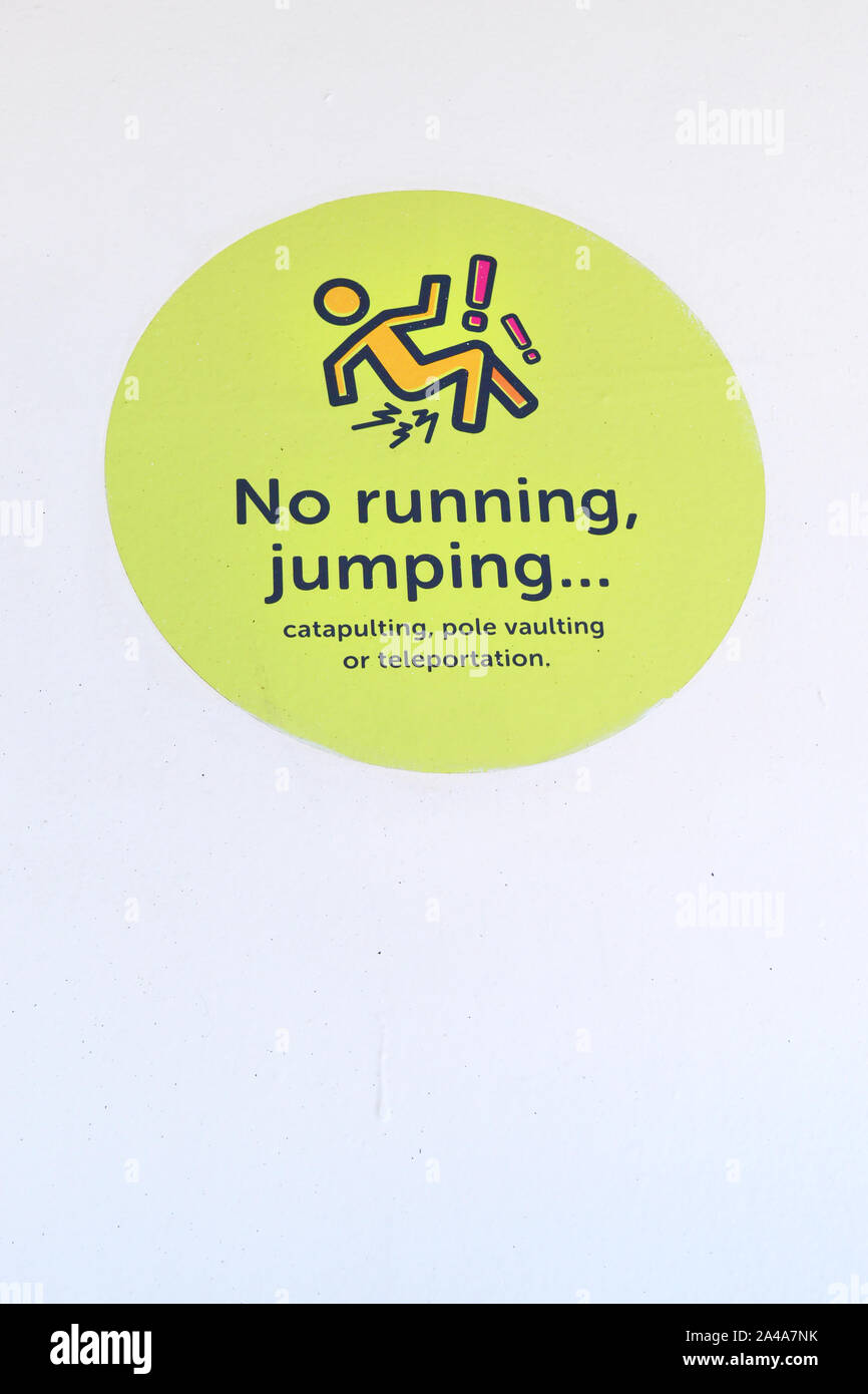 Caution Sign Running High Resolution Stock Photography and Images - Alamy