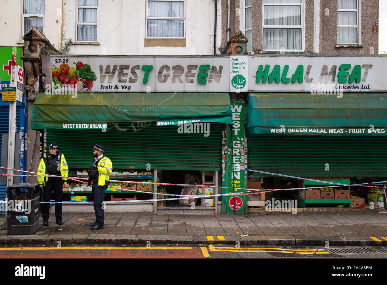 Police outside the West Green Halal Meat butcher's shop on West Green ...
