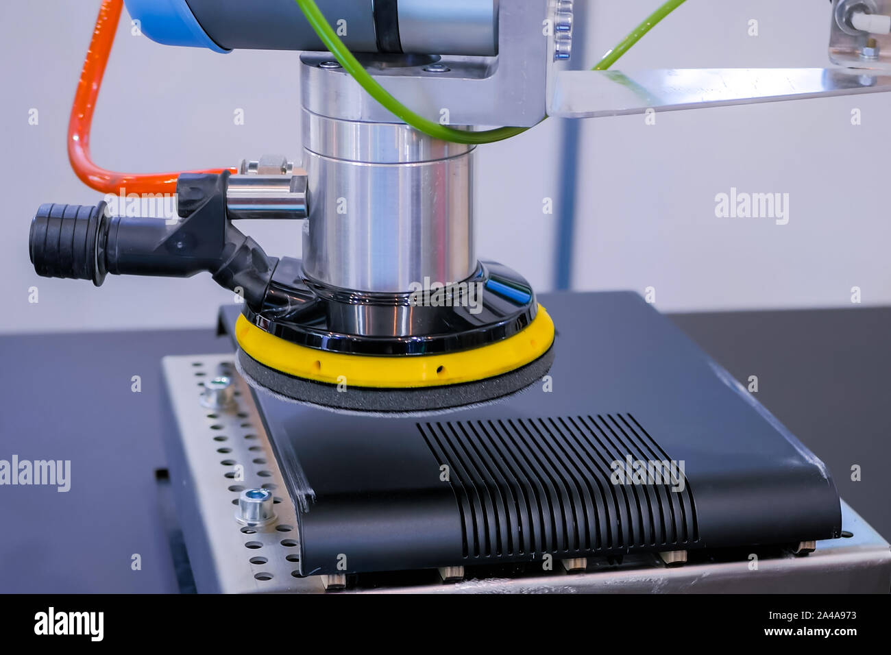 Automated robotic arm moves and places objects at trade show ...