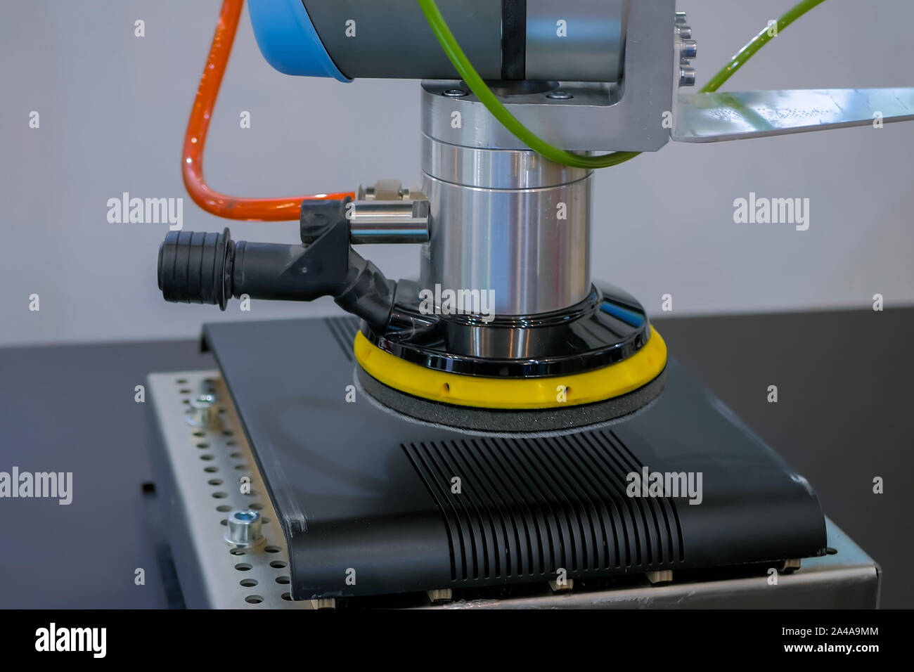 Automated robotic arm moves and places objects at trade show ...