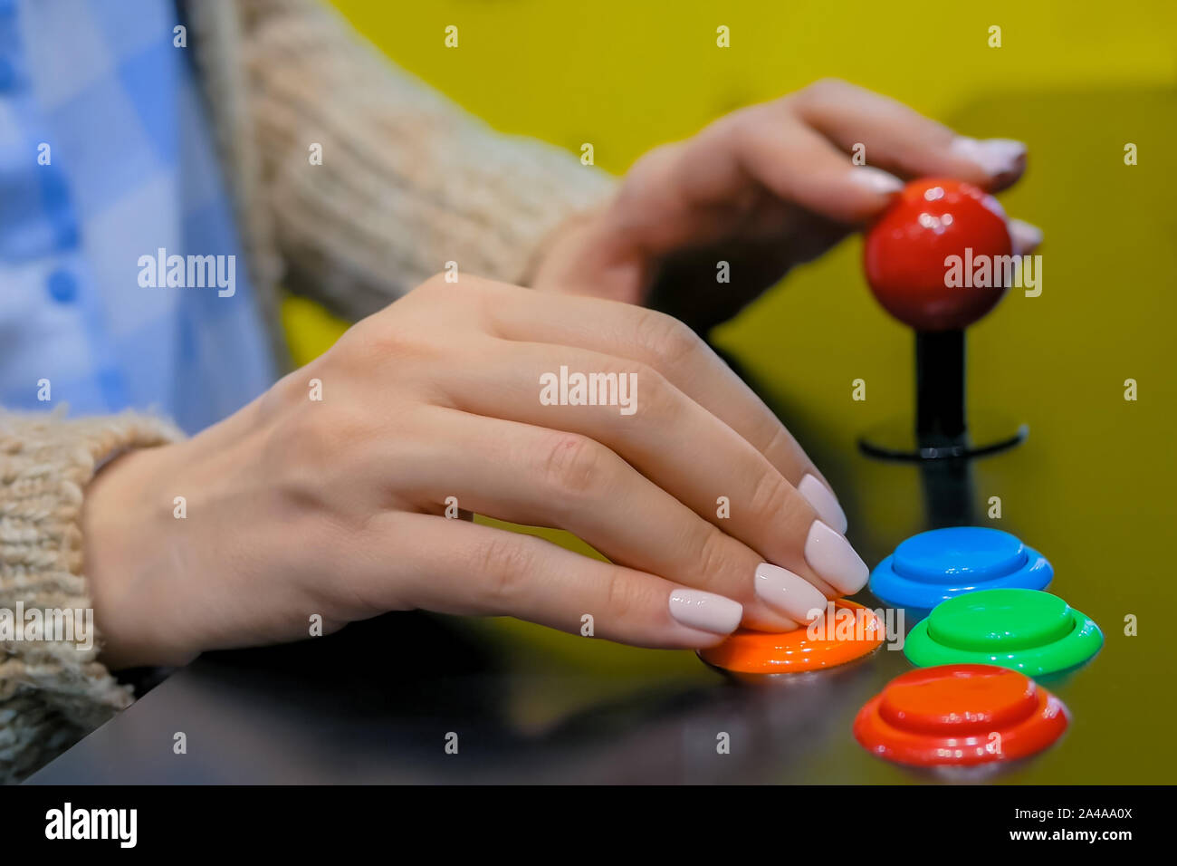 Gaming, technology, 80s concept - woman playing retro arcade machine ...