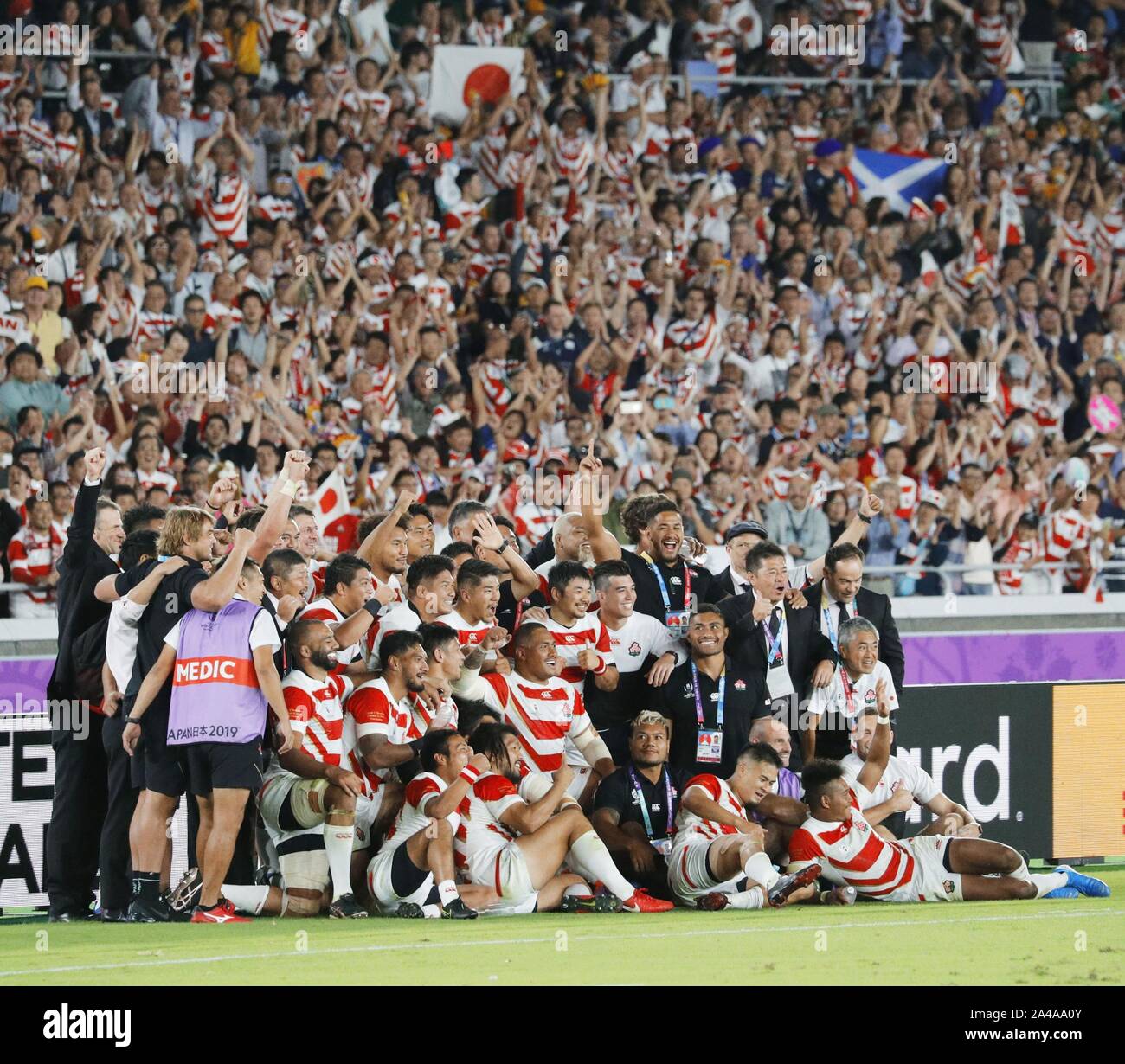 Japan players pose for a photo after defeating Scotland in a Rugby ...