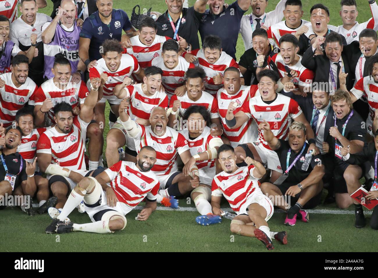 Japan players pose for a photo after defeating Scotland in a Rugby ...