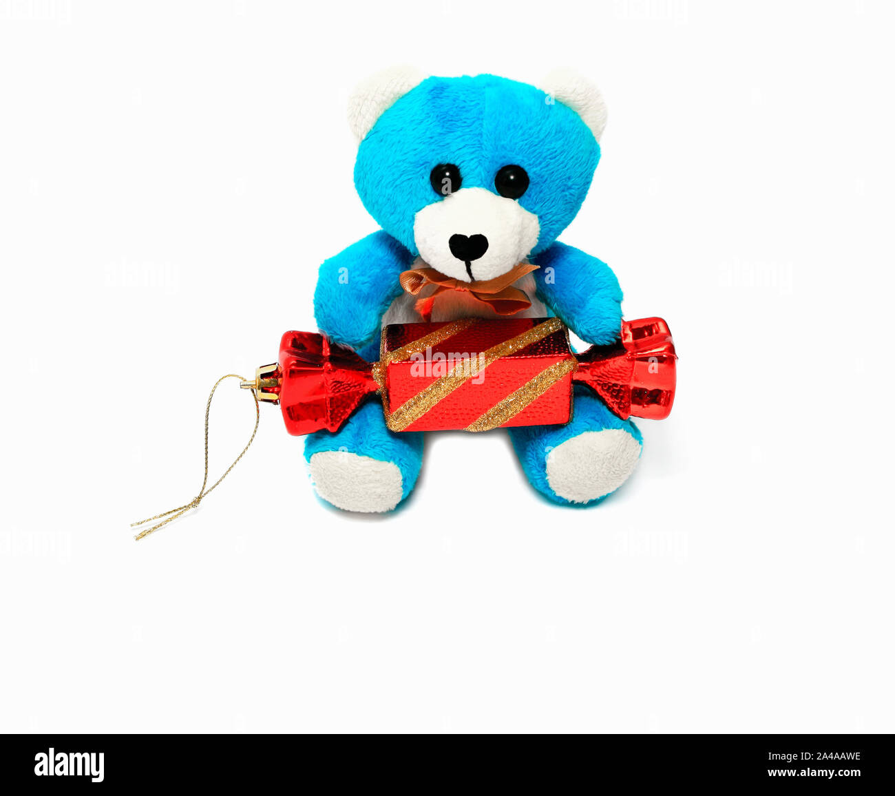 Christmas teddy bear with candy. Close-up. Isolated over white ...