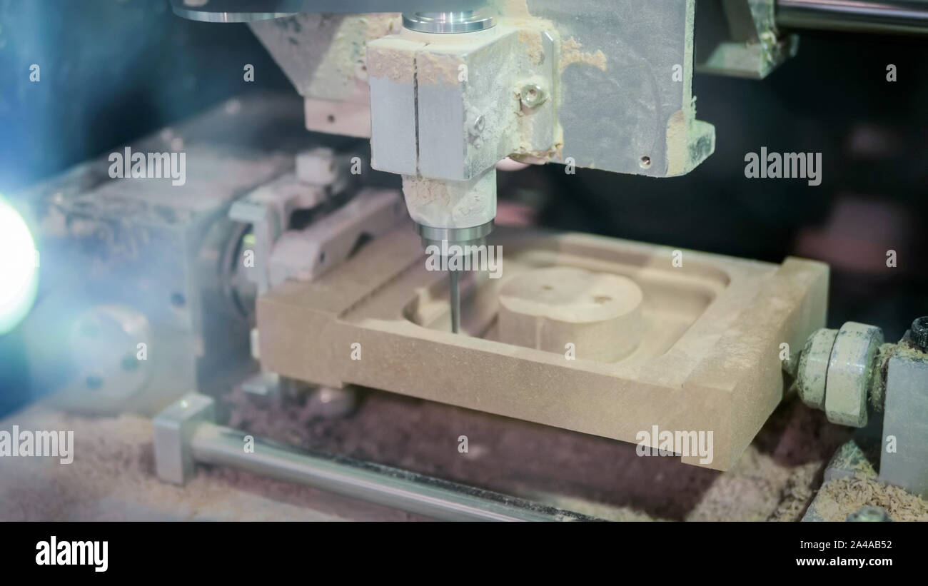 CNC engraving - milling machine during work Stock Photo - Alamy