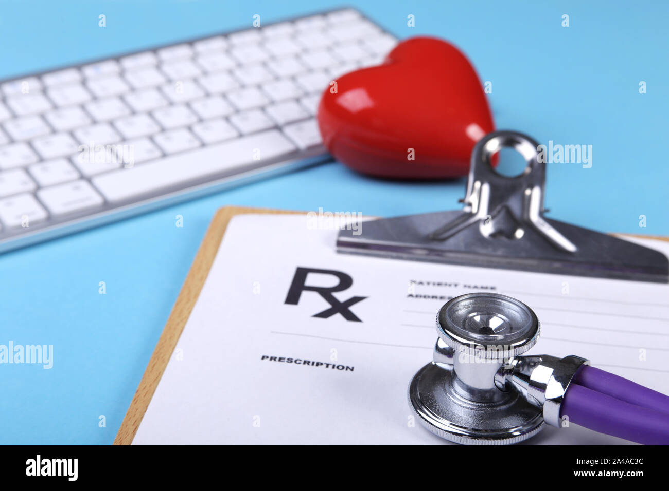 Medical stethoscope and red heart lying on cardiogram chart closeup ...